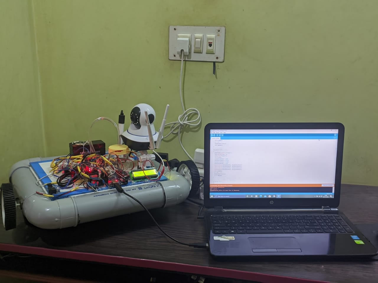 Remotely Controlled Boat for Water quality Monitoring and Sampling